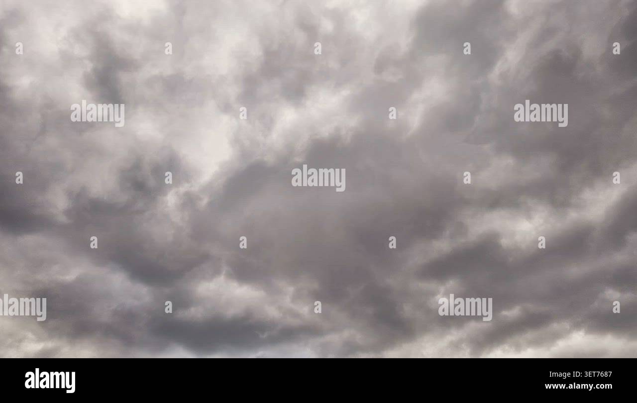 Moving storm clouds turning blue sky Stock Video Footage - Alamy