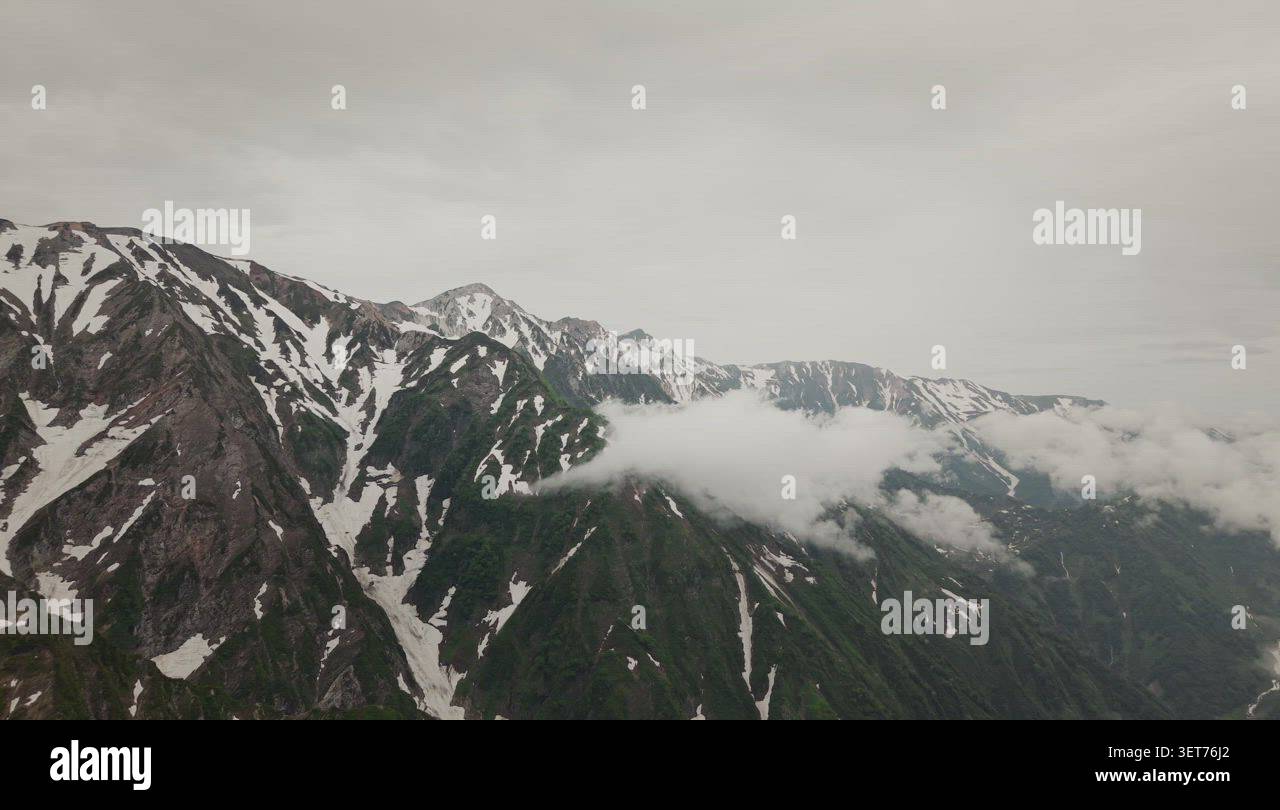 Mountain ridges and low clouds in the Northern Japanese Alps Stock ...