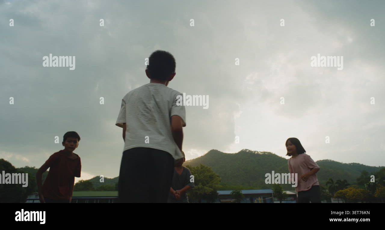 Slow motion: Children Playing With Blue Ball at Sunset Stock Video ...