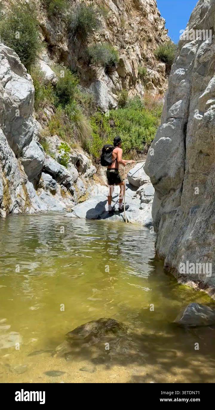 Happy Man Climbing a Rock with Rope Stock Video Footage - Alamy