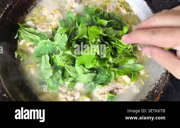 Cooking Tom Kha Gai in pan, Thai famous food Stock Video Footage - Alamy