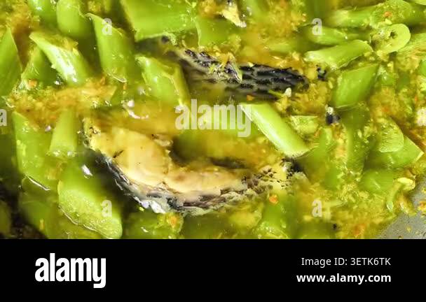 Cooking Taro stem curry in pan, indoor Chiangmai Thailand Stock Video ...
