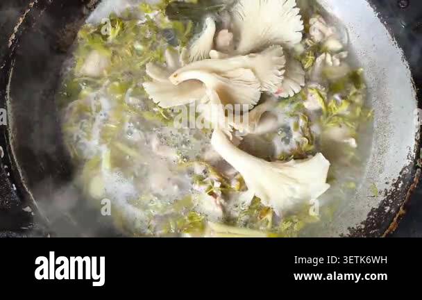 Cooking Tom Kha Gai in pan, Thai famous food Stock Video Footage - Alamy