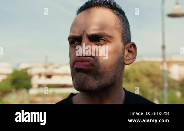 young man making funny mouth expressions Stock Video Footage - Alamy