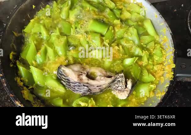 Cooking Taro stem curry in pan, indoor Chiangmai Thailand Stock Video ...