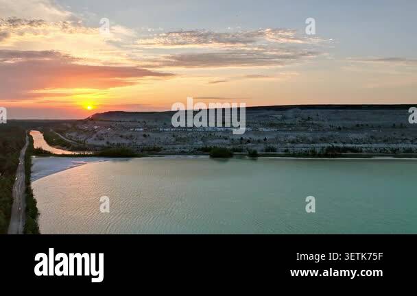 Aerial sunset still video of Auvere Power Plant Settlement Basin in Ida ...