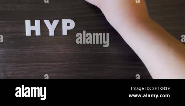 the word hypotension written on a dark background with white block ...
