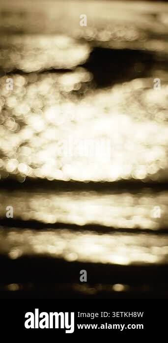 A stunning 4K slow motion abstract background featuring shimmering ...