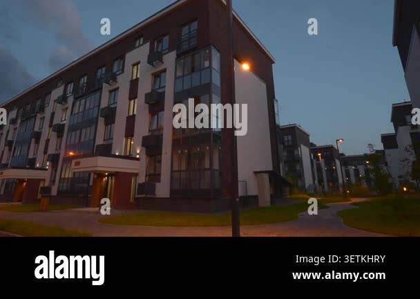Late sequence view of a modern apartment complex, with the main ...