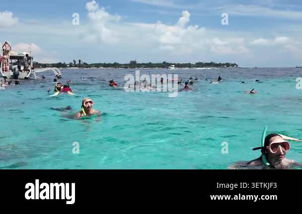 GILI TRAWANGAN, INDONESIA - March 22, 2026: overtourism at a snorkeling ...