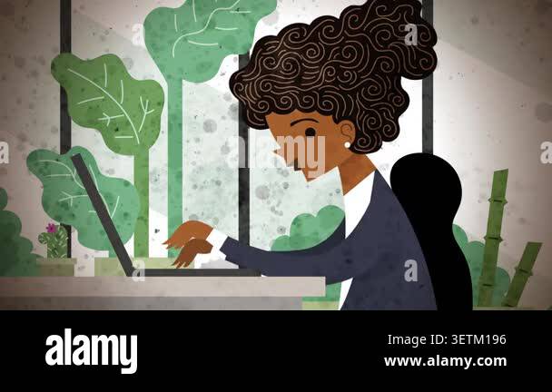 office employee working at a computer in a plant filled office Stock ...