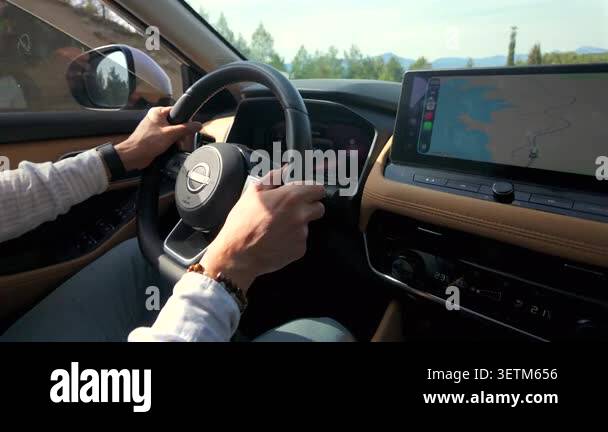 Antalya, Turkey - March 6, 2026: Driver using Nissan X Trail e Power ...
