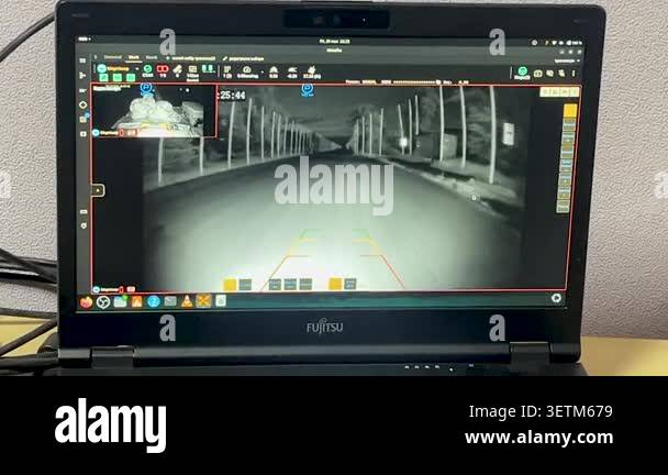 Kharkiv, Ukraine - April, 16, 2026: Monitor displaying a nighttime road ...