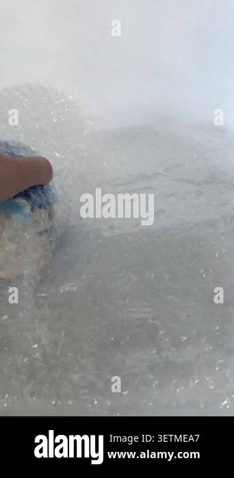 Packing Handmade Candle in Bubble Wrap for Safe Shipping Small Business ...