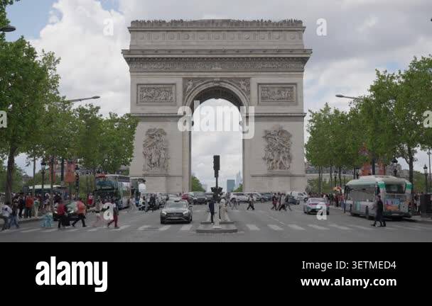PARIS, FRANCE, JUNE 4, 2026 Pedestrians use a crosswalk on Avenue des ...
