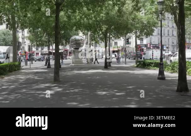 PARIS, FRANCE, JUNE 4, 2026 La Quatrieme Pomme metallic apple sculpture ...