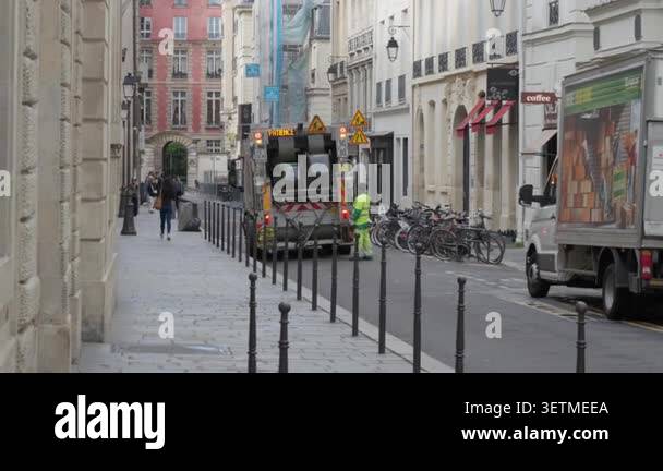 PARIS, FRANCE, JUNE 4, 2026 Municipal sanitation workers collect waste ...
