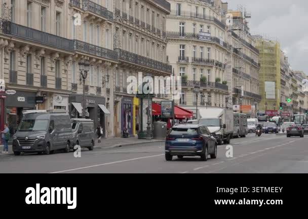 PARIS, FRANCE, JUNE 4, 2026 Vehicles drive down Avenue de l Opera past ...