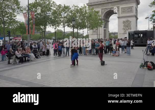 PARIS, FRANCE, JUNE 4, 2026 Street dancers perform acrobatic breakdance ...