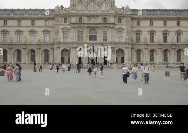 PARIS, FRANCE, JUNE 4, 2026 Historic Louvre museum palace facade and ...