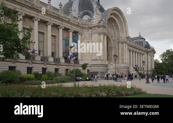 PARIS, FRANCE, JUNE 4, 2026 Tourists and pedestrians walk outside the ...