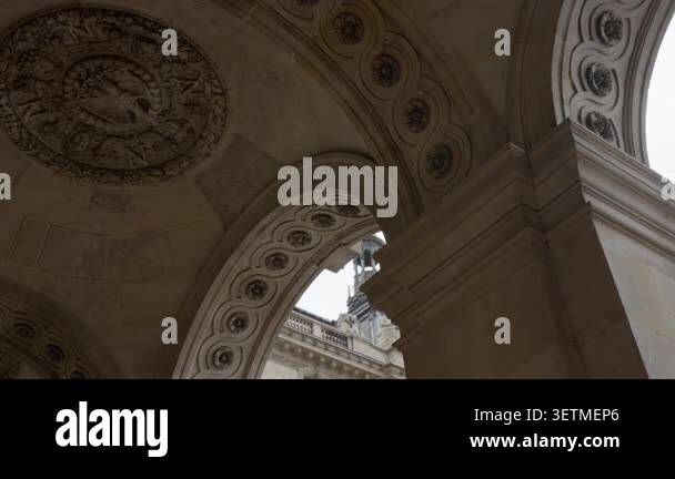 Historical stone archway of classical european museum building facade ...