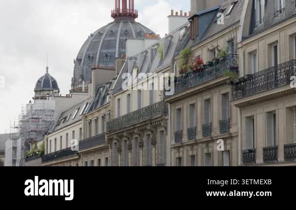 Classic Parisian residential building facades feature historic ...