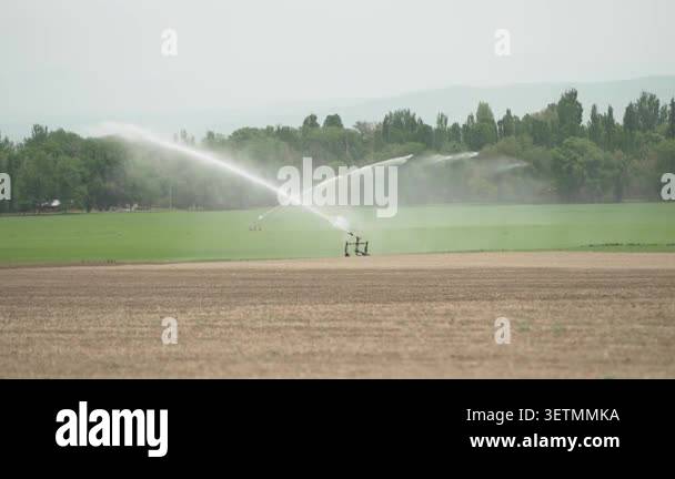 A stateoftheart modern irrigation system is efficiently watering crops ...