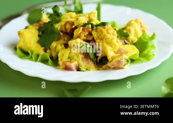 homemade egg dish with arugula on green background Stock Video Footage ...