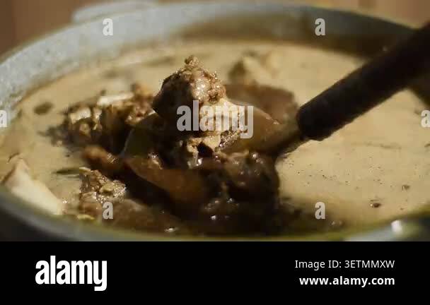 Traditional Indonesian konro soup made with beef ribs and aromatic ...