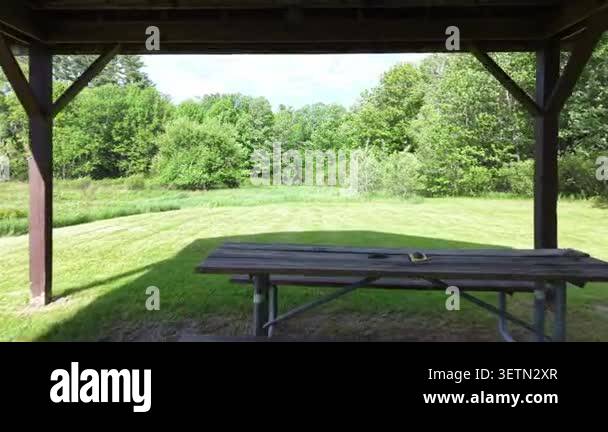 Picnic Table Under Pavilion Overlooking Green Park Trees On Sunny ...