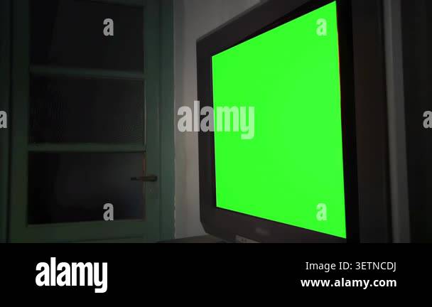 Zoom In To CRT Television Screen With Green Screen Chroma Key In Dark ...