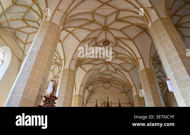 Cinematic handheld view inside the UNESCO Biertan fortified church in ...