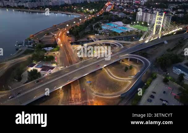 Aerial night timelapse, hyperlapse of the illuminated Ciurel cable ...