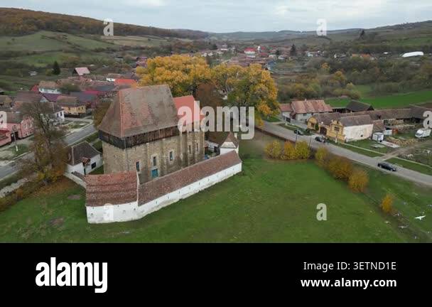 High-angle drone footage of the historic St. Andrew Lutheran fortified ...