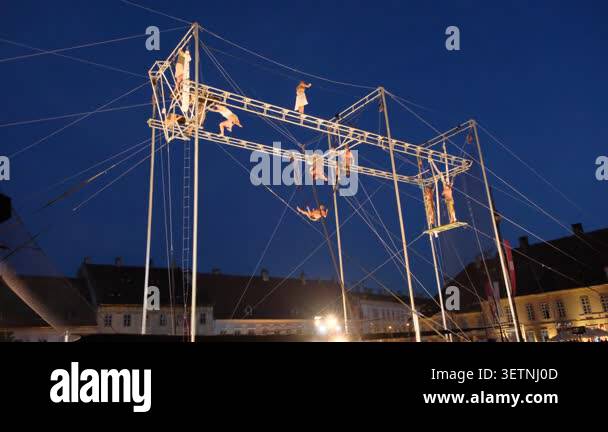 Sibiu City, Romania - 20 June 2026 acrobats performing a daring flying ...