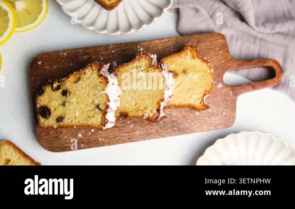 Sliced cake with raisins on a wooden board Stock Video Footage - Alamy