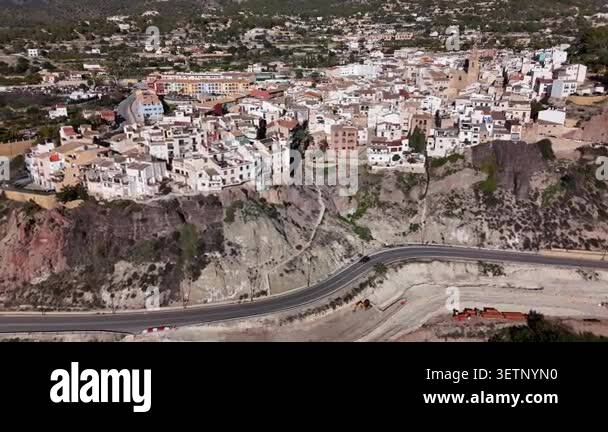 Drone aerial view of Finestrat village in Alicante Spain, showcasing ...
