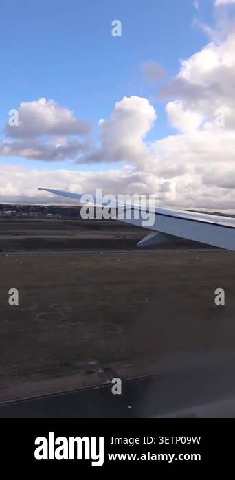 The view from an aeroplane window as it lands Stock Video Footage - Alamy