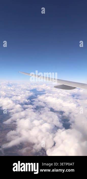 View from an aeroplane window whilst in flight Stock Video Footage - Alamy