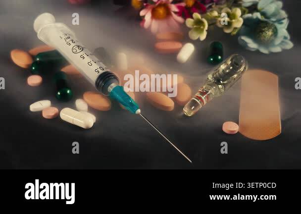 Pharmacy Syringe Medicine Glass Capsules and Pills Surrounded By ...