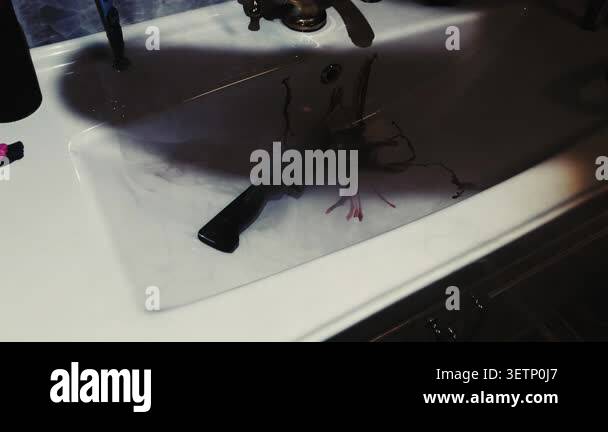 Scary Ghostly Hand Shadow Trying to Grab Bloody Knife in Bathroom Sink ...