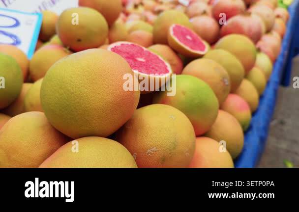 Fresh Juicy Organic Fruit Grapefruit in Bazaar Stock Video Footage - Alamy
