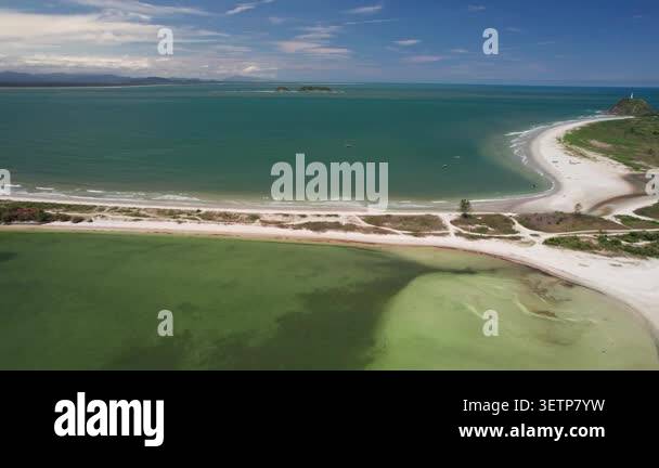 Aerial view of a beautiful coastal landscape featuring vibrant green ...