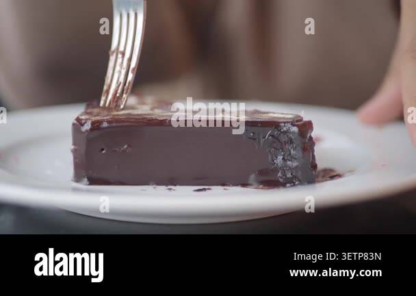 Afternoon chocolate cake at the cafe Stock Video Footage - Alamy