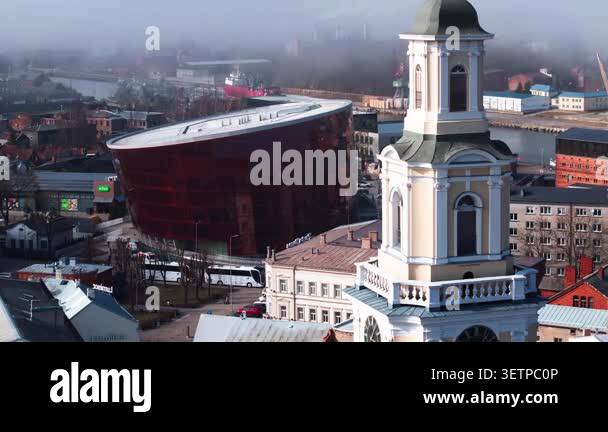 Aerial over Liepaja, Latvia shows Lielais Dzintars, baroque church ...