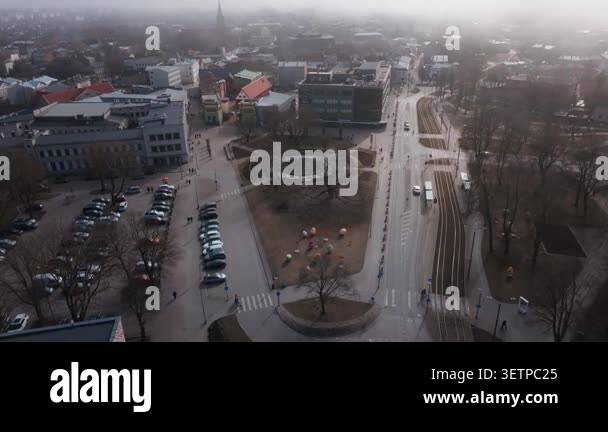 Aerial town center with circular sunken garden and oak, tram tracks ...