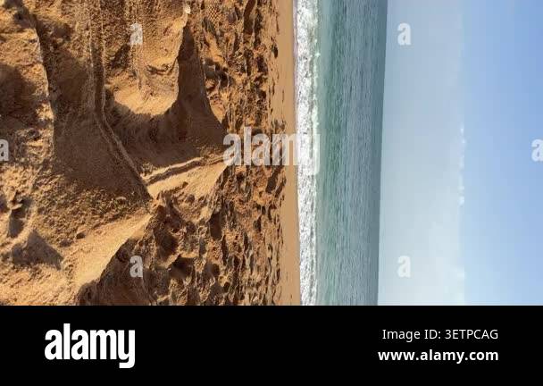 Sandcastle on beach by sea, rotated summer seaside view Stock Video ...
