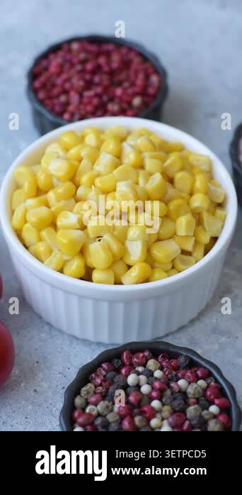 Golden, sweet canned corn kernels or maize for salads and vegetarian ...