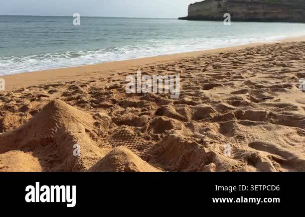 Sand mounds on beach by sea, summer seaside landscape close up Stock ...